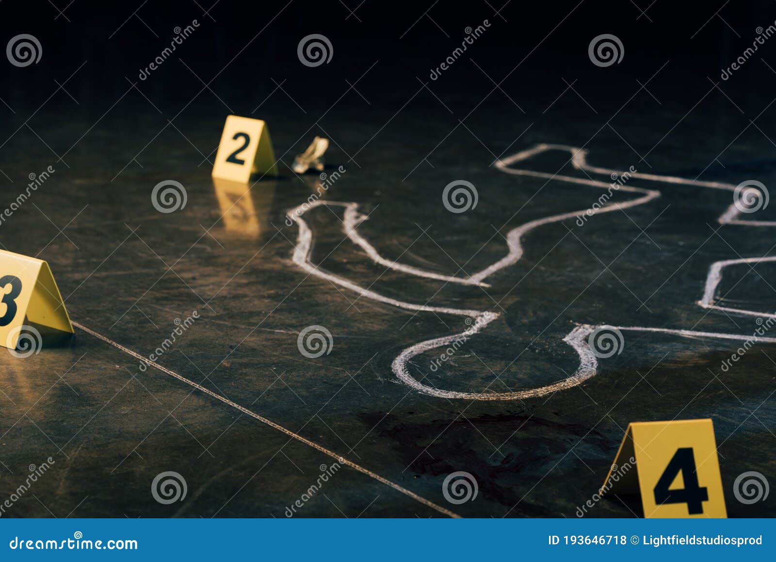 Focus of Chalk Outline and Evidence Markers at Crime Scene Stock Photo ...