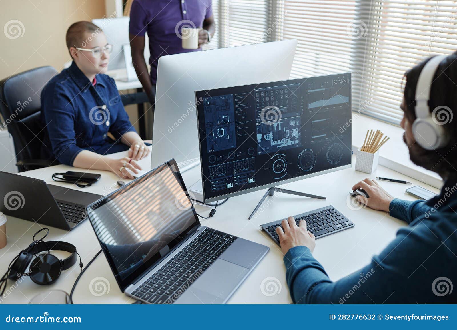 Focus on Computer Screen with Cyber Data and Laptop on Workplace of ...