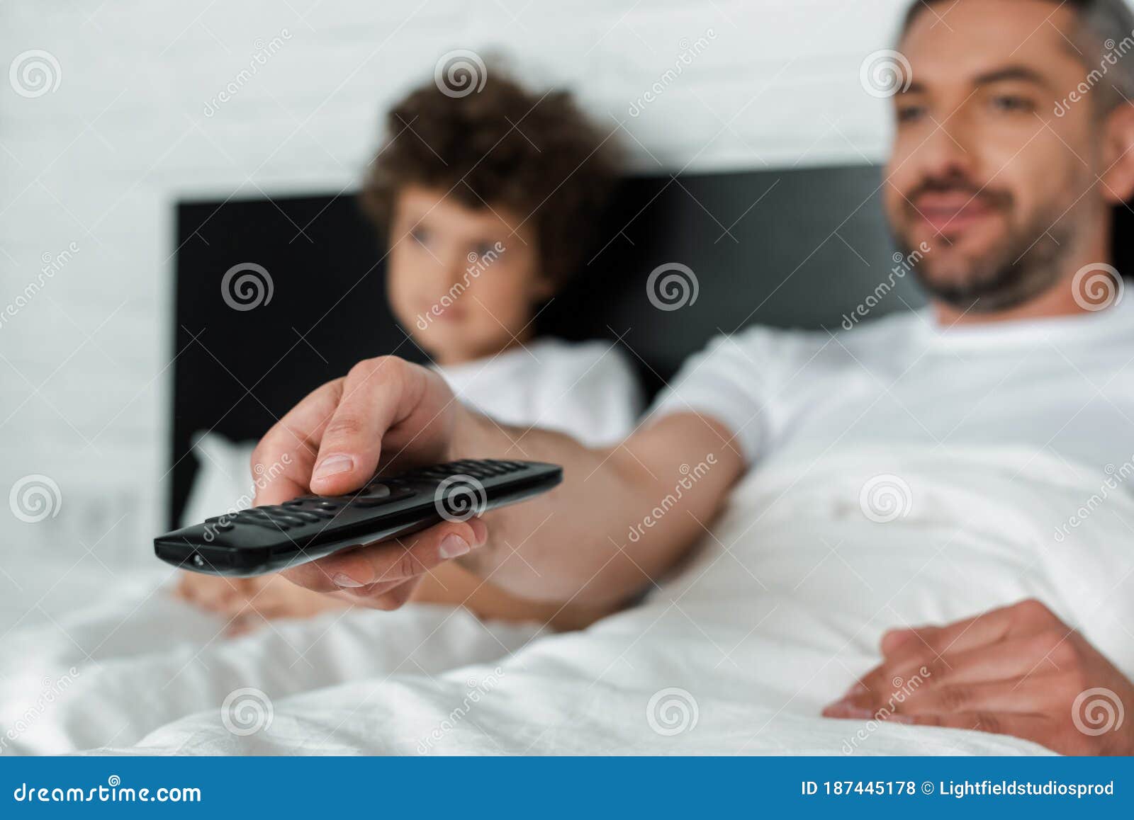Focus of Father Holding Remote Controller Stock Photo - Image of ...