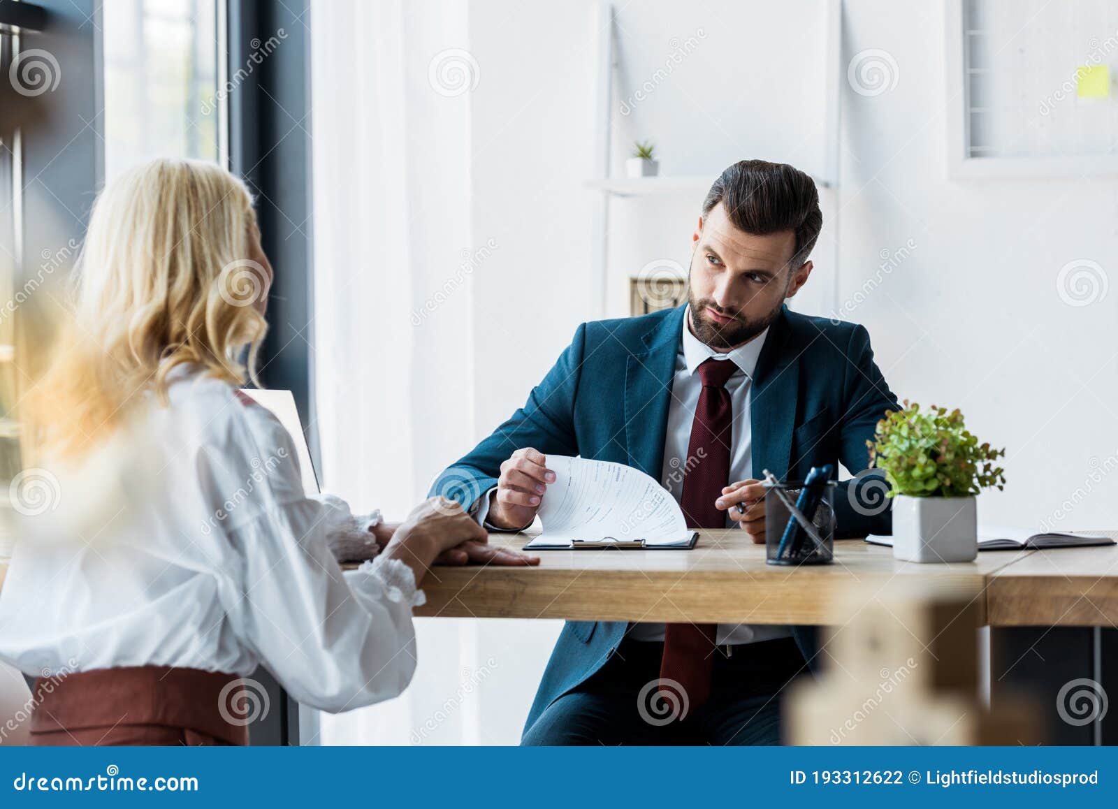 Focus of Handsome Recruiter Looking at Blonde Employee Stock Photo ...