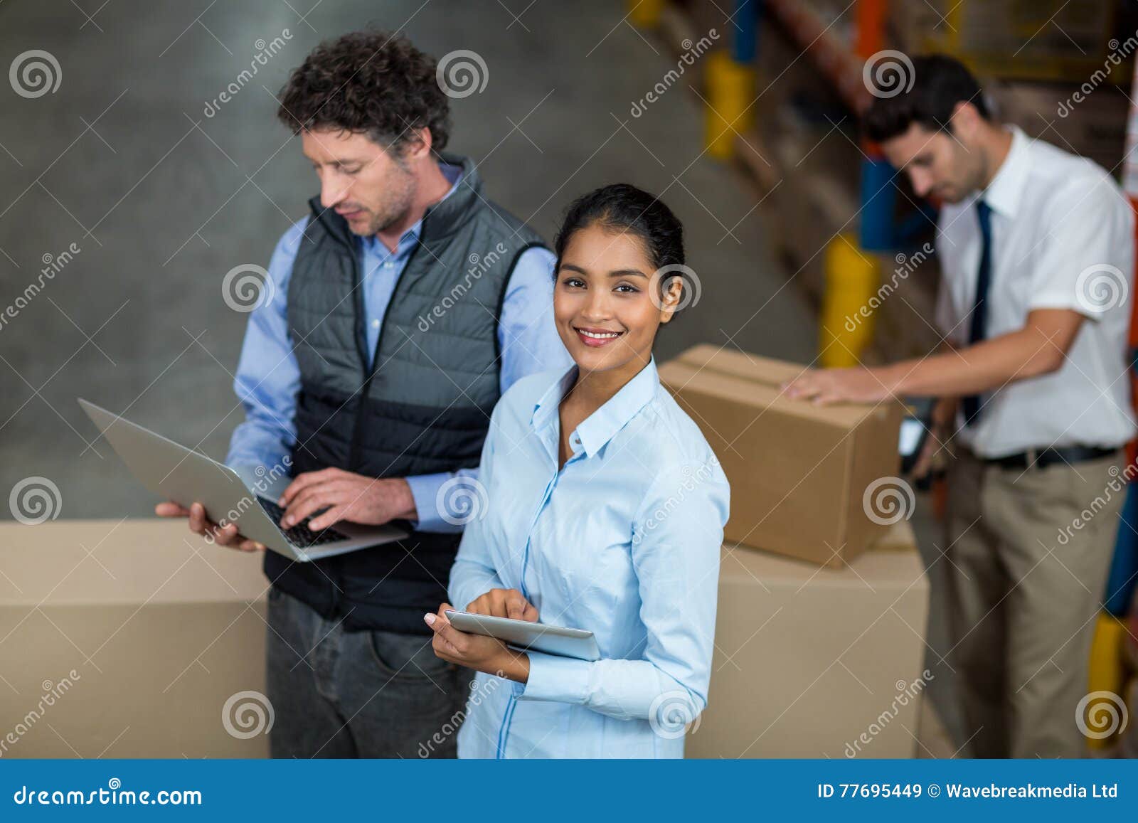 Focus of Happy Manager is Smiling and Looking the Camera during Work ...
