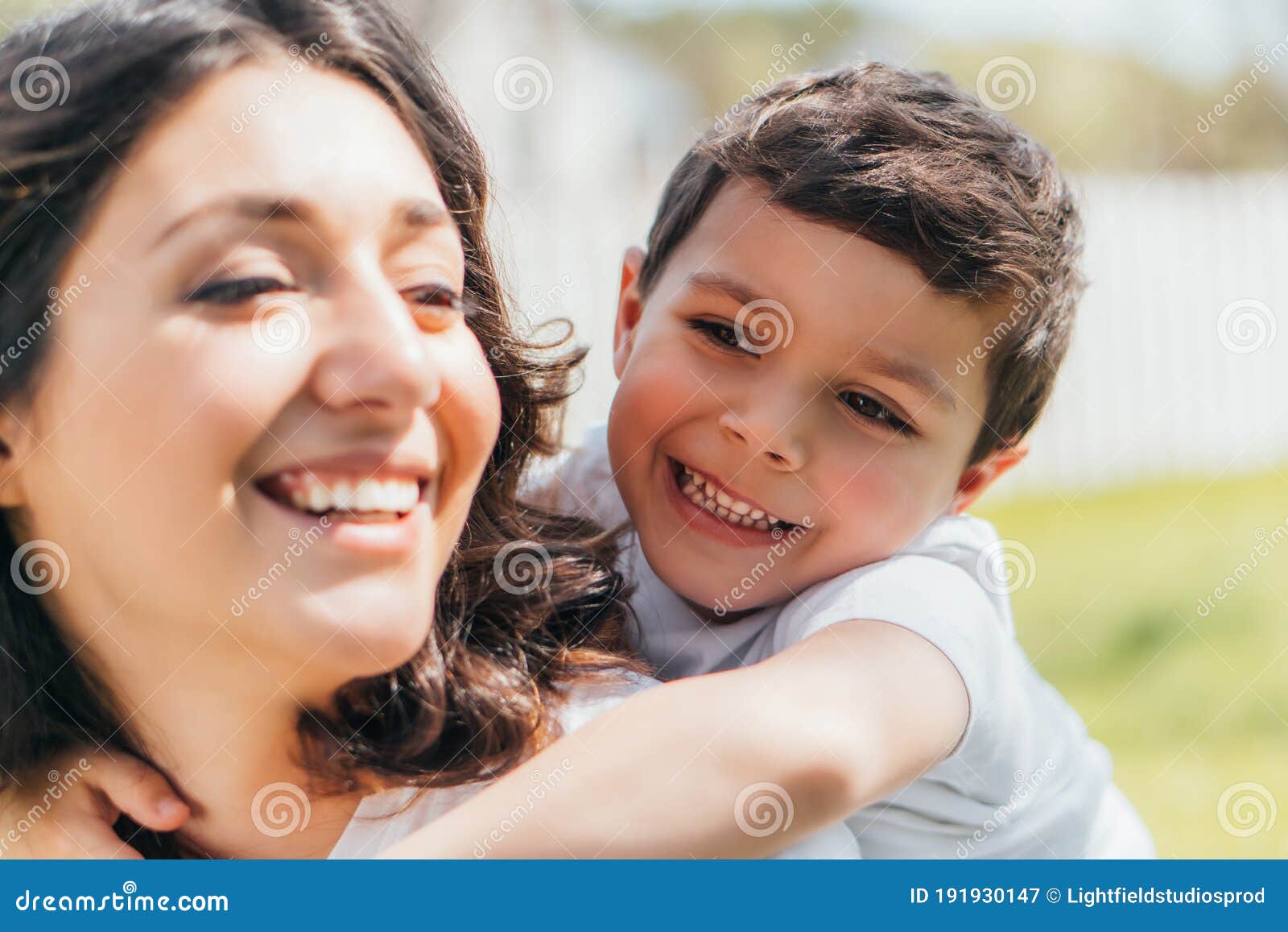 Focus Of Happy Son Hugging Cheerful Mother Stock Image Image Of