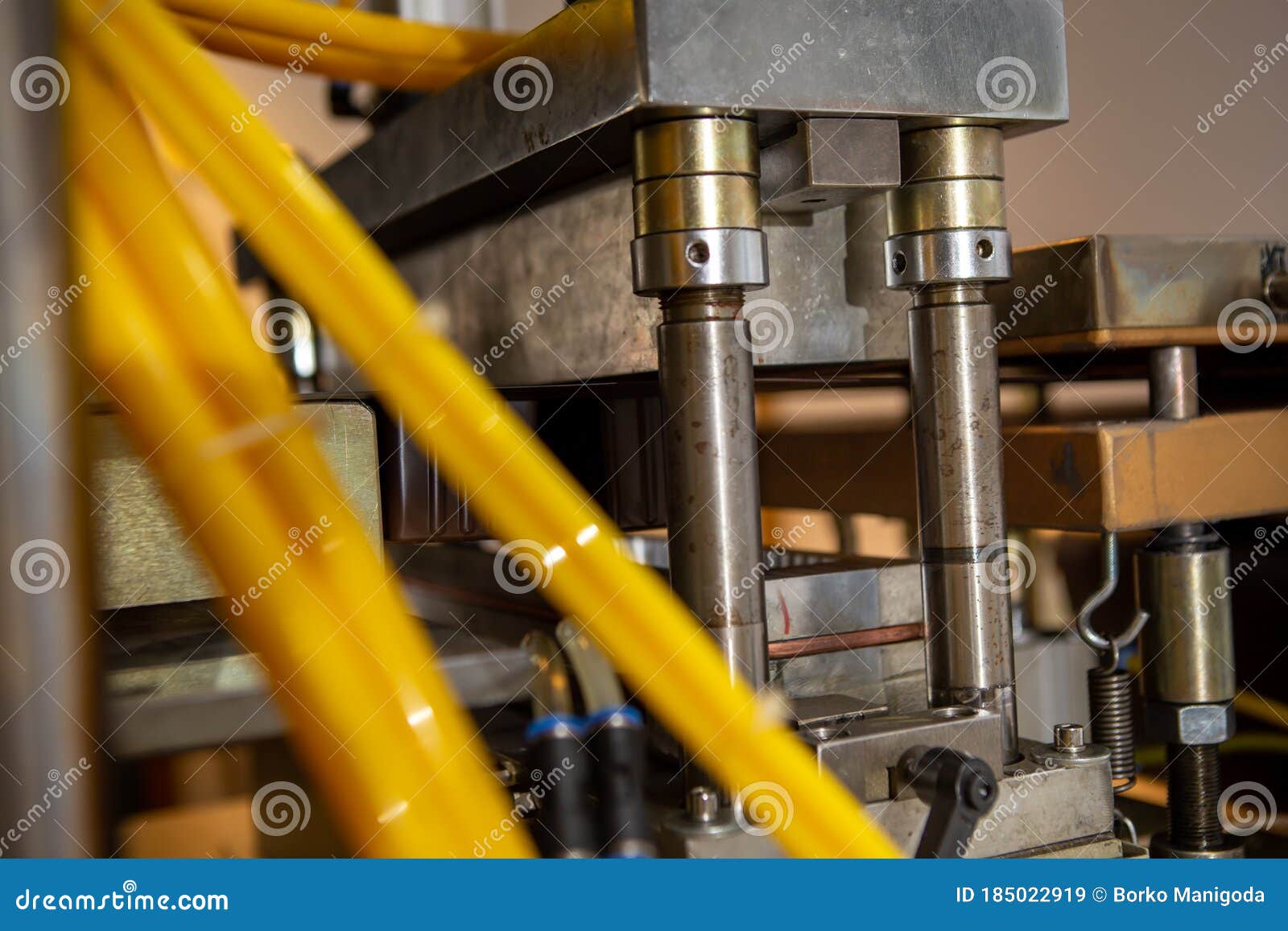 Focus on the Hydraulic Press on the Plastic Packaging Machine. Industry ...