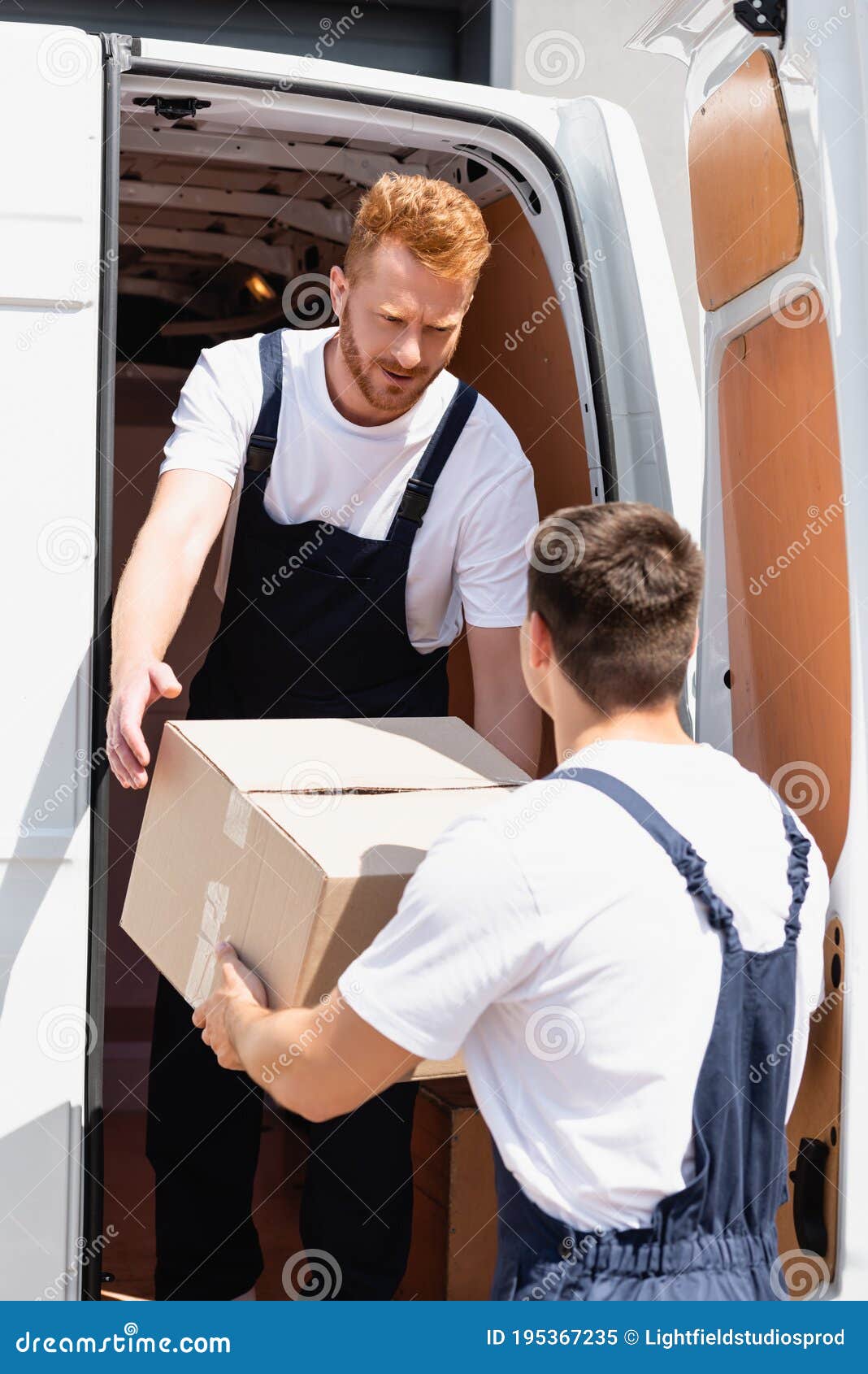 Focus of Loader Giving Carton Box Stock Image - Image of delivery ...
