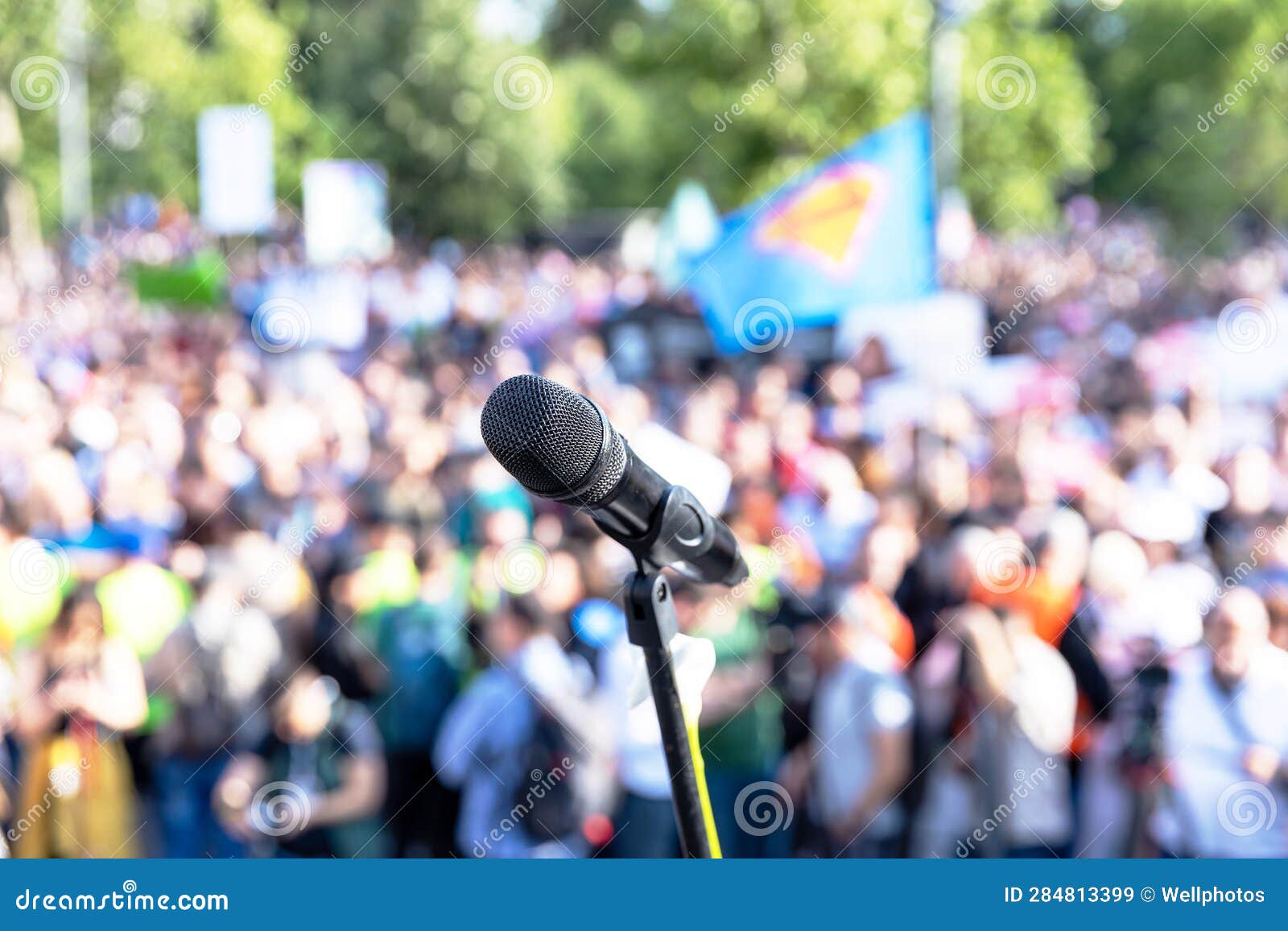 Public Communication Concept. Microphone in Focus at Mass Protest or ...