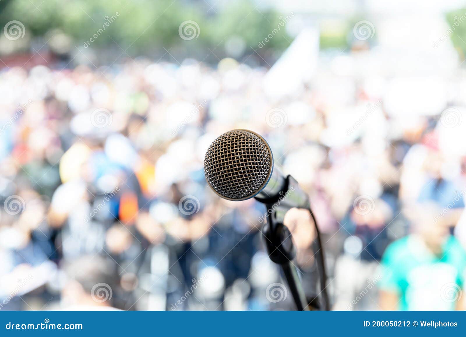 Focus on Microphone, Blurred Group of People at Mass Protest Stock ...