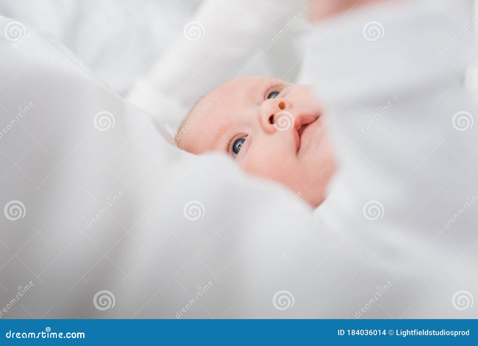Focus of Mother and Cute Baby Looking Up Stock Photo - Image of ...