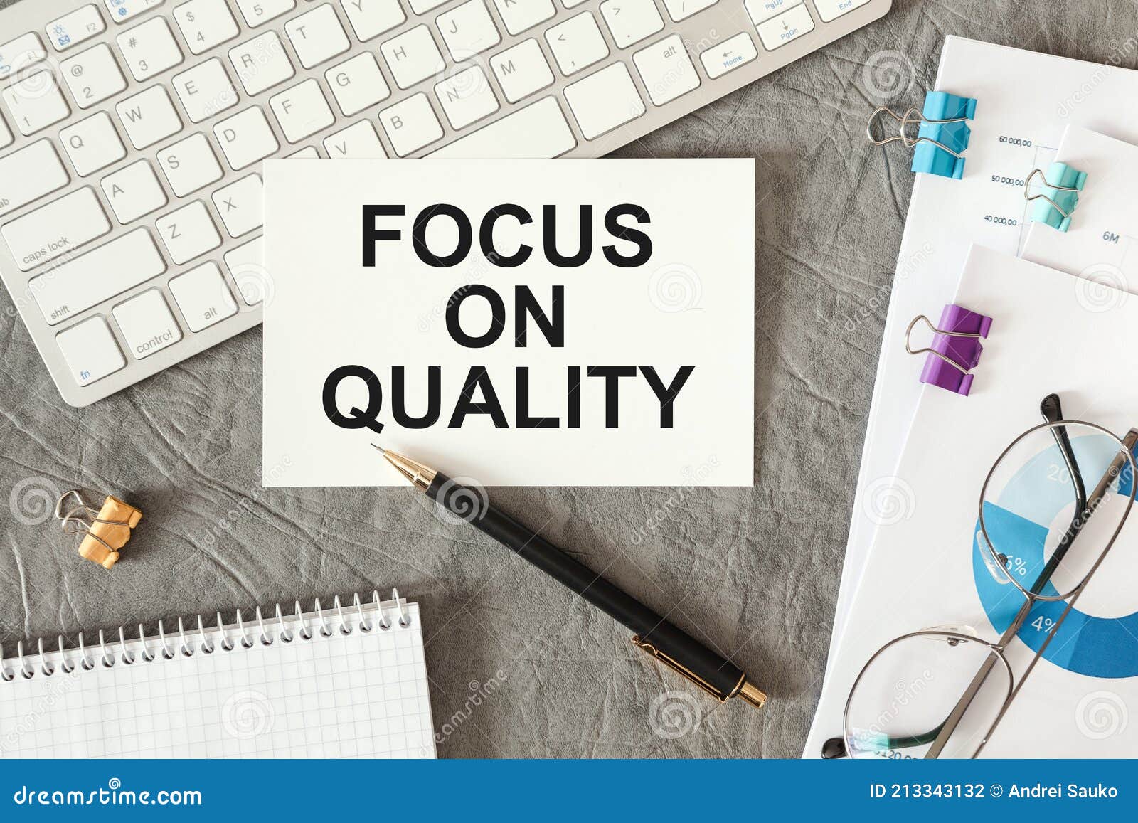 FOCUS on QUALITY is Written in a Document on the Office Desk Stock ...