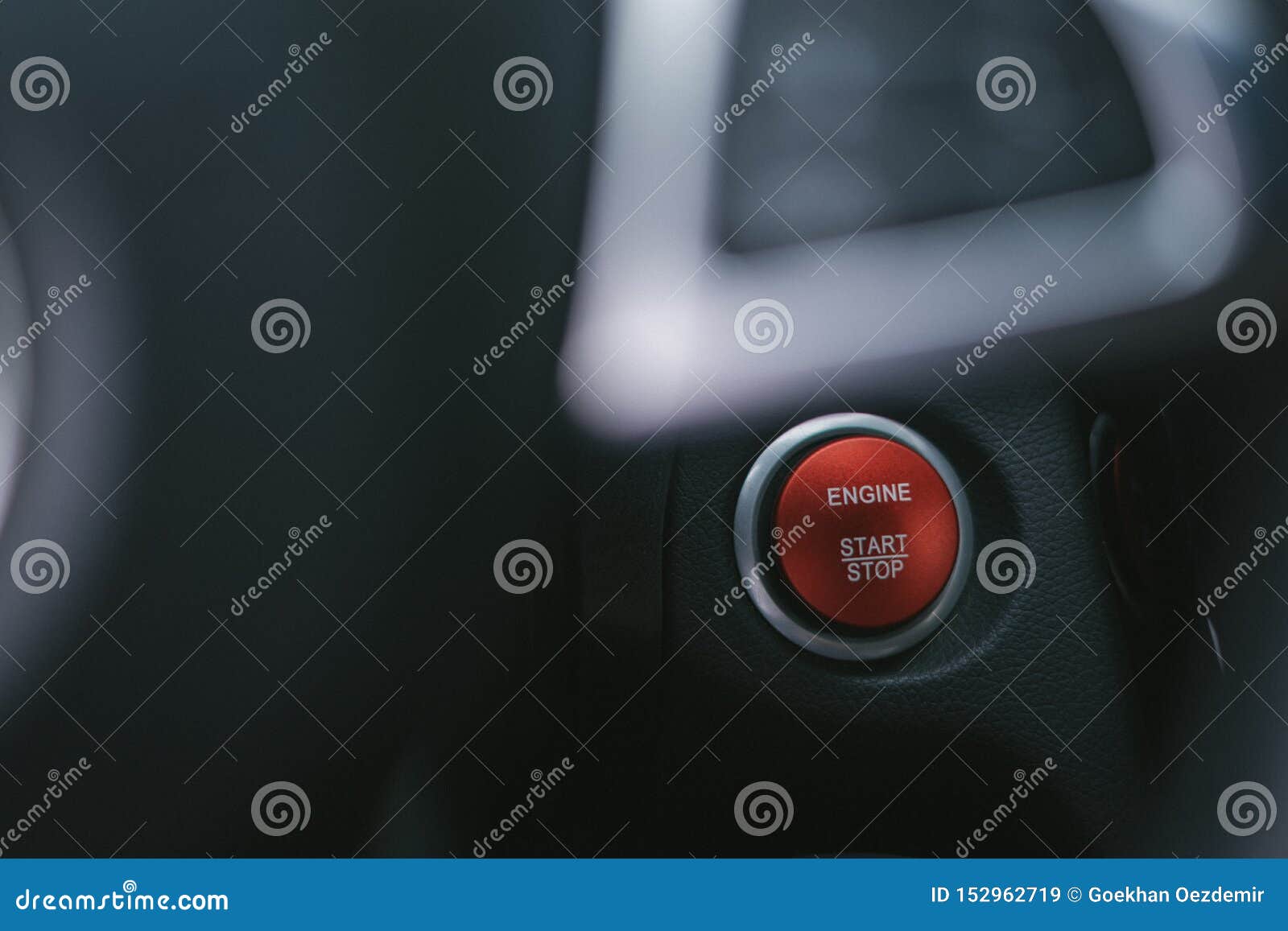Focus on Red Start Stop Button in Car with Unfocused Steering Wheel ...
