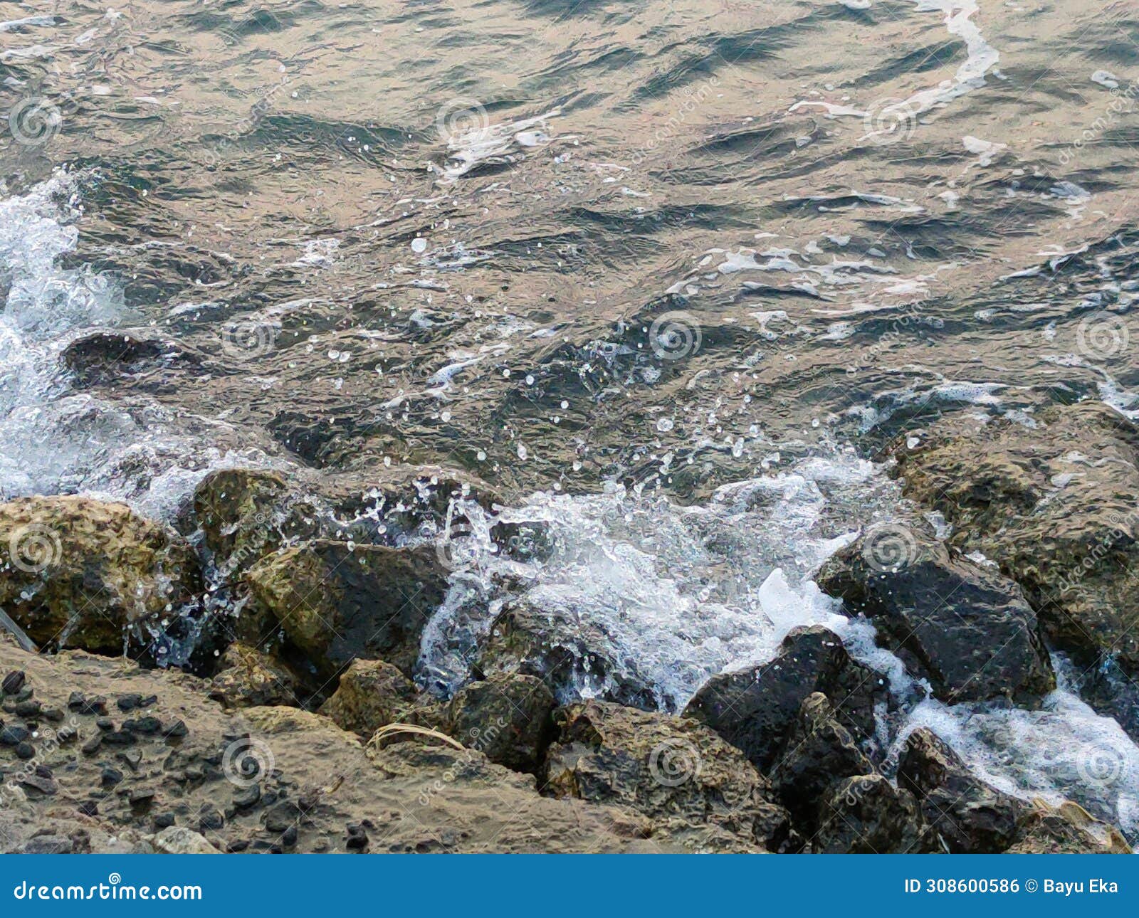 Focus on the Rocks that are Being Swept by the Ocean Waves Stock Photo ...