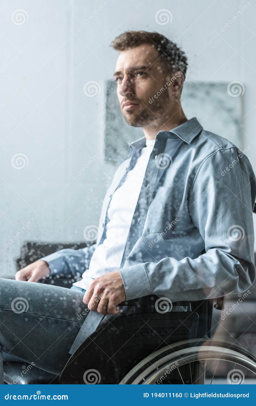 Focus of Sad Disabled Man on Wheelchair Stock Photo - Image of glass ...