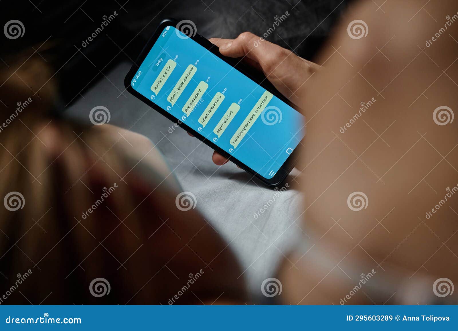 Focus on Screen of Smartphone with Aggressive and Offensive Messages ...