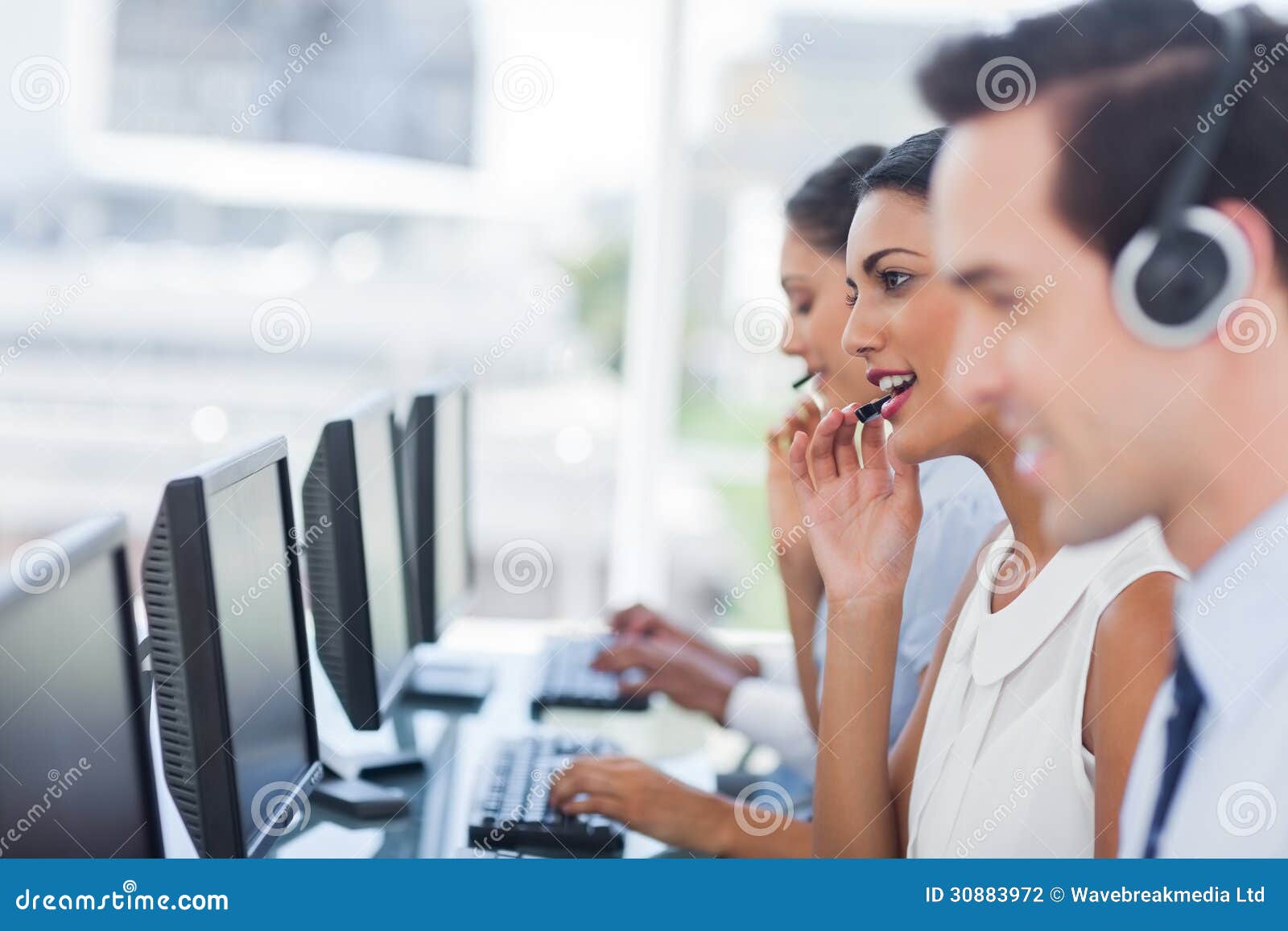 Focus of Smiling Call Centre Agent Stock Photo - Image of helpful ...