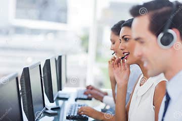 Focus of Smiling Call Centre Agent Stock Photo - Image of helpful ...