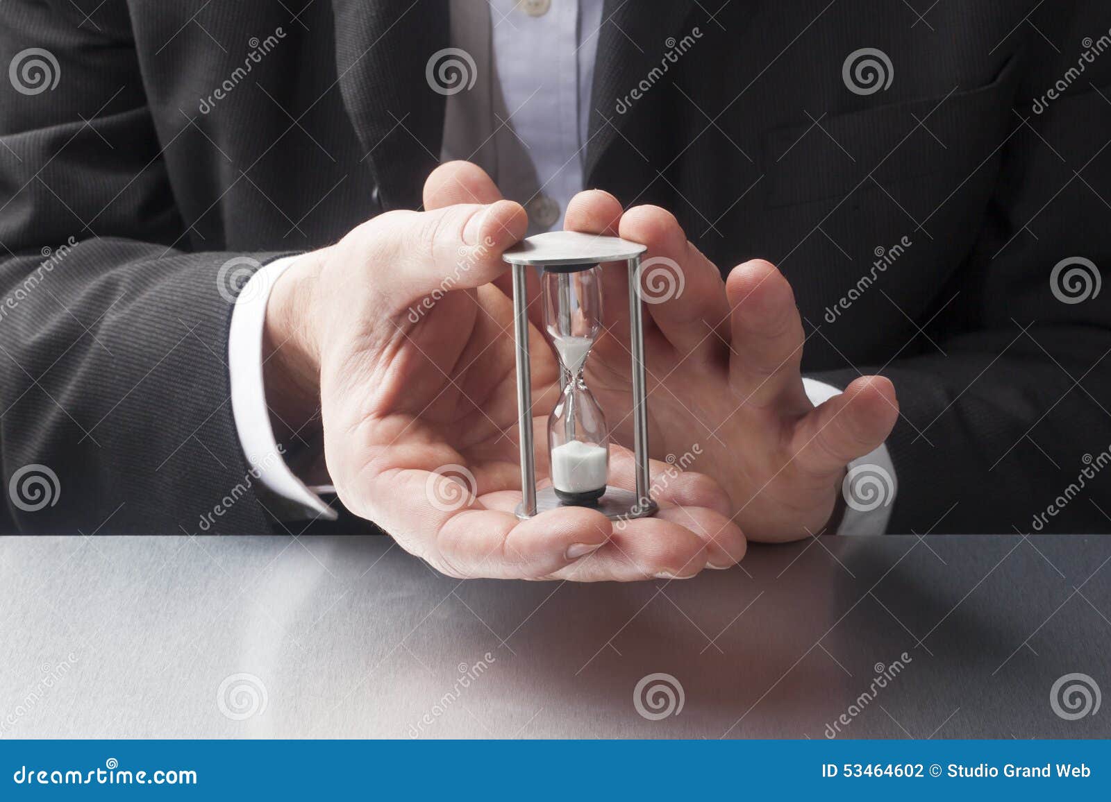 Focus on Time Management with Hands Holding a Hourglass Stock Photo ...