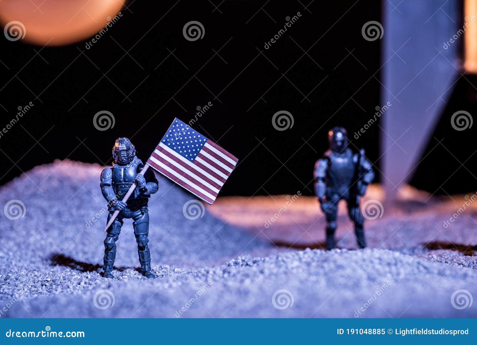 Focus of Toy Astronauts Holding American Flag in Space Stock Image ...
