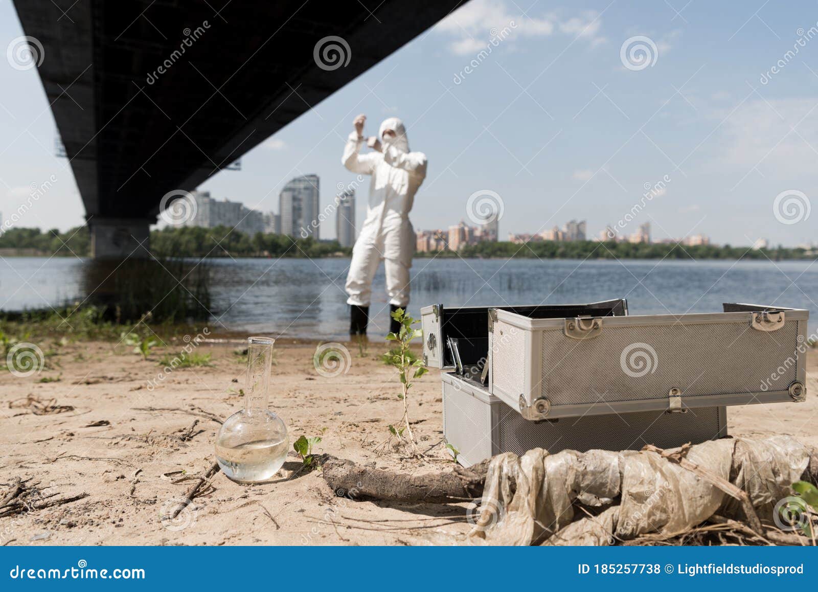 Focus of Water Inspector in Protective Costume and Inspection Kit with ...