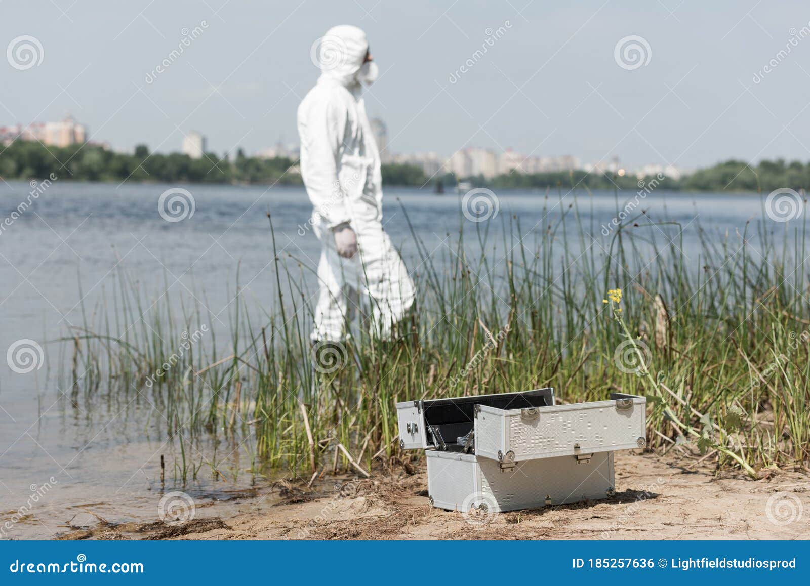Focus of Water Inspector in Protective Costume and Inspection Kit on ...