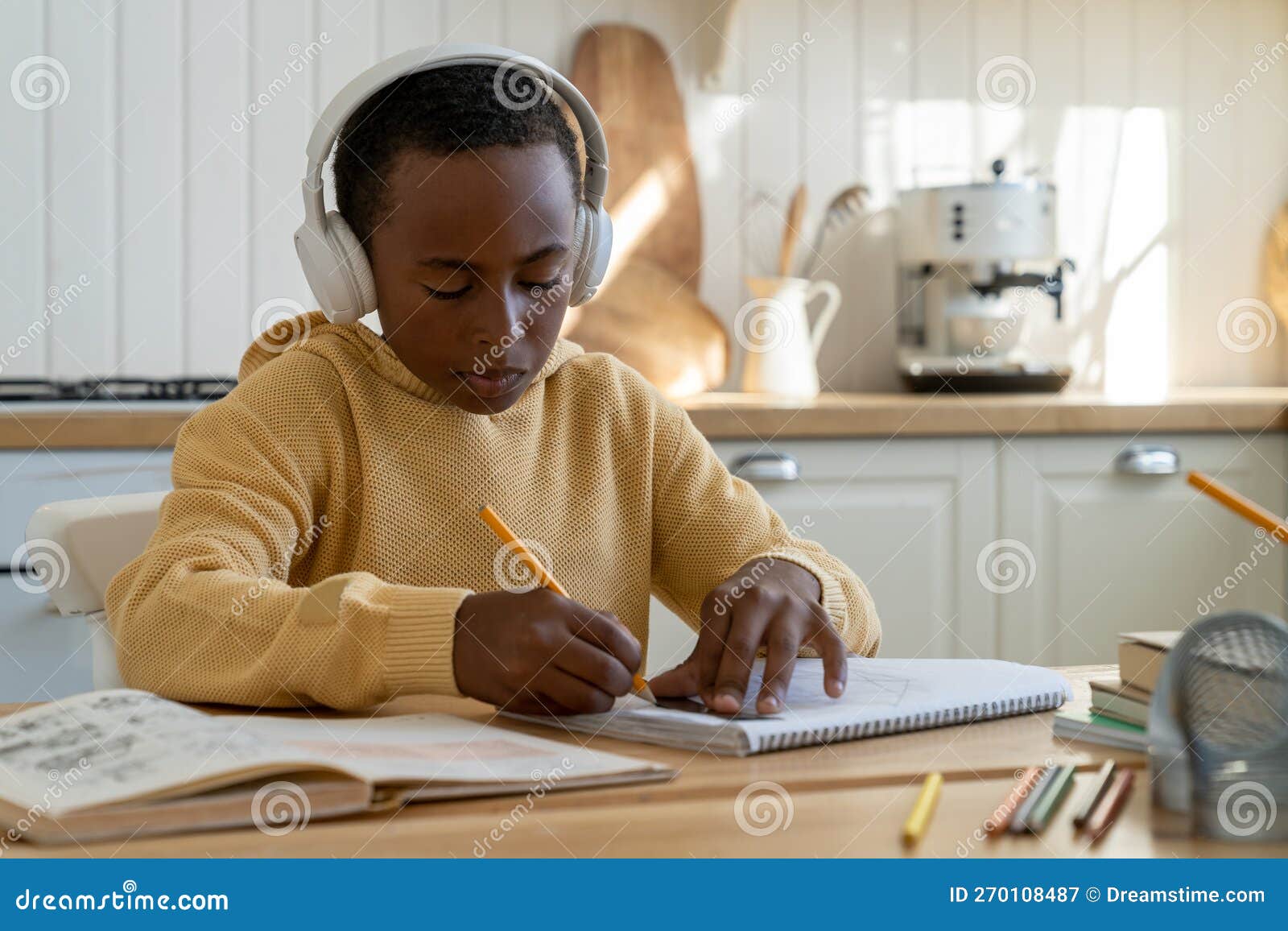 Focused African Child Boy Sitting at Desk Working on Engineering ...