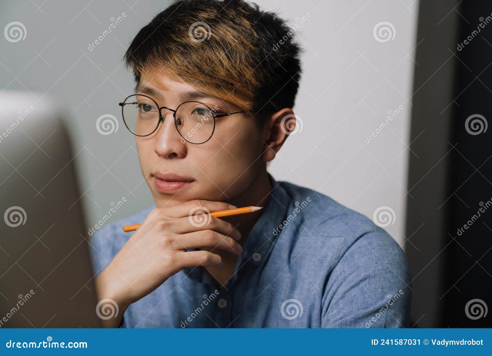Focused Asian Guy in Eyeglasses Working with Laptop in Office Stock ...