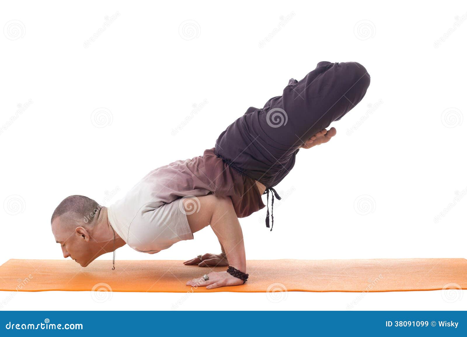 Focused Athletic Man Posing in Difficult Yoga Pose Stock Image - Image ...