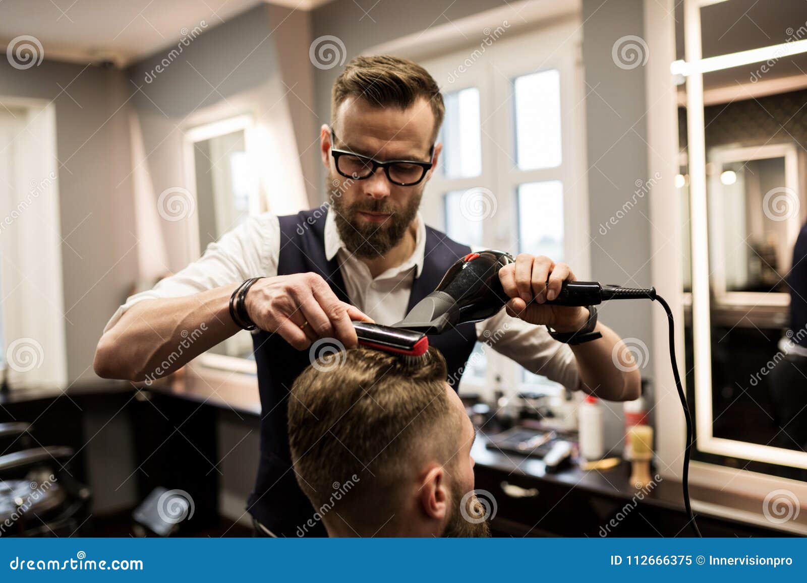 Focused Barber Girl Working With Hair Clipper, Serving Client. Young ...