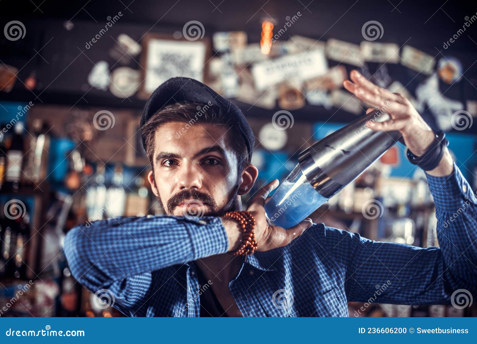 Focused Barkeeper Makes a Cocktail at the Night Club Stock Photo ...