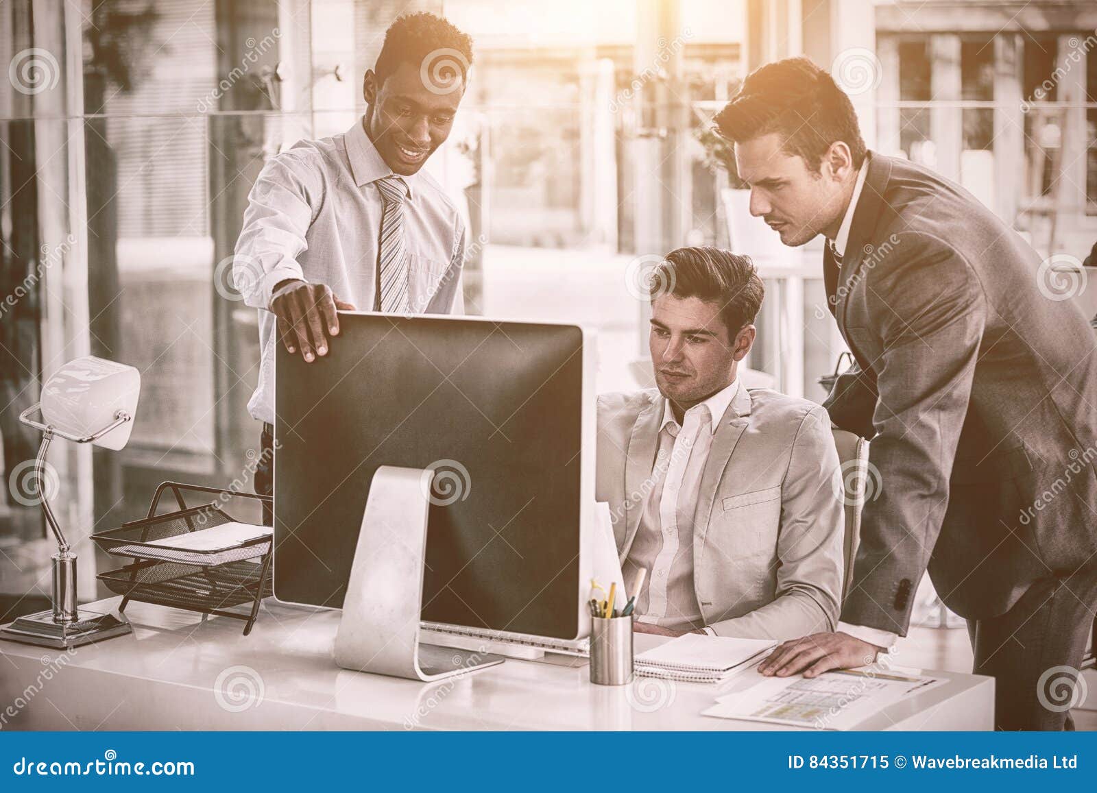 Focused Business People Looking into Computer Stock Image - Image of ...