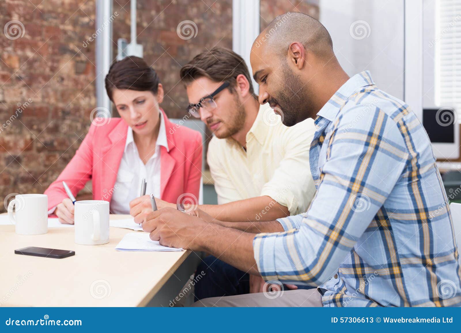 Focused Business People Taking Down Important Notes Stock Image - Image ...