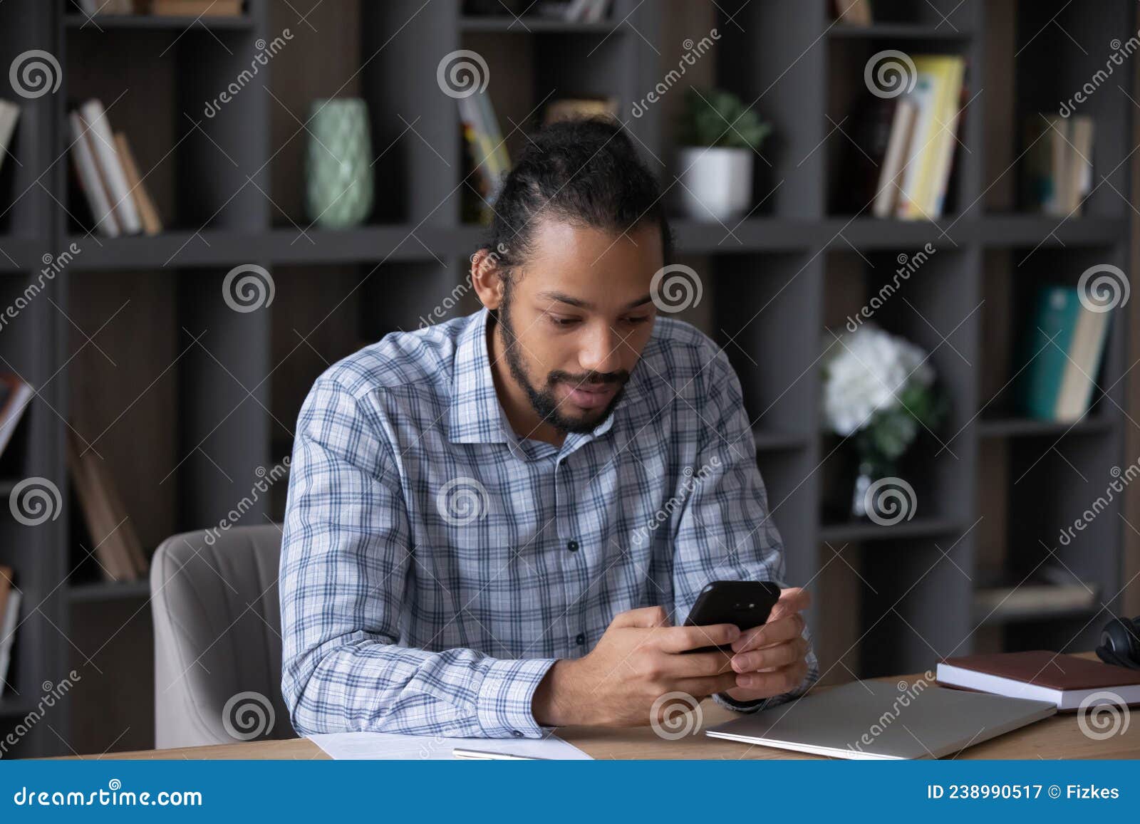 Focused Busy Millennial Black Business Man Browsing Internet on ... Focused Busy Millennial Black Business Man Browsing Internet on ...