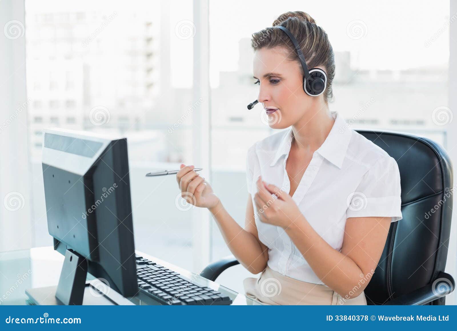 Focused Call Centre Agent Having a Call Stock Photo - Image of shirt ...
