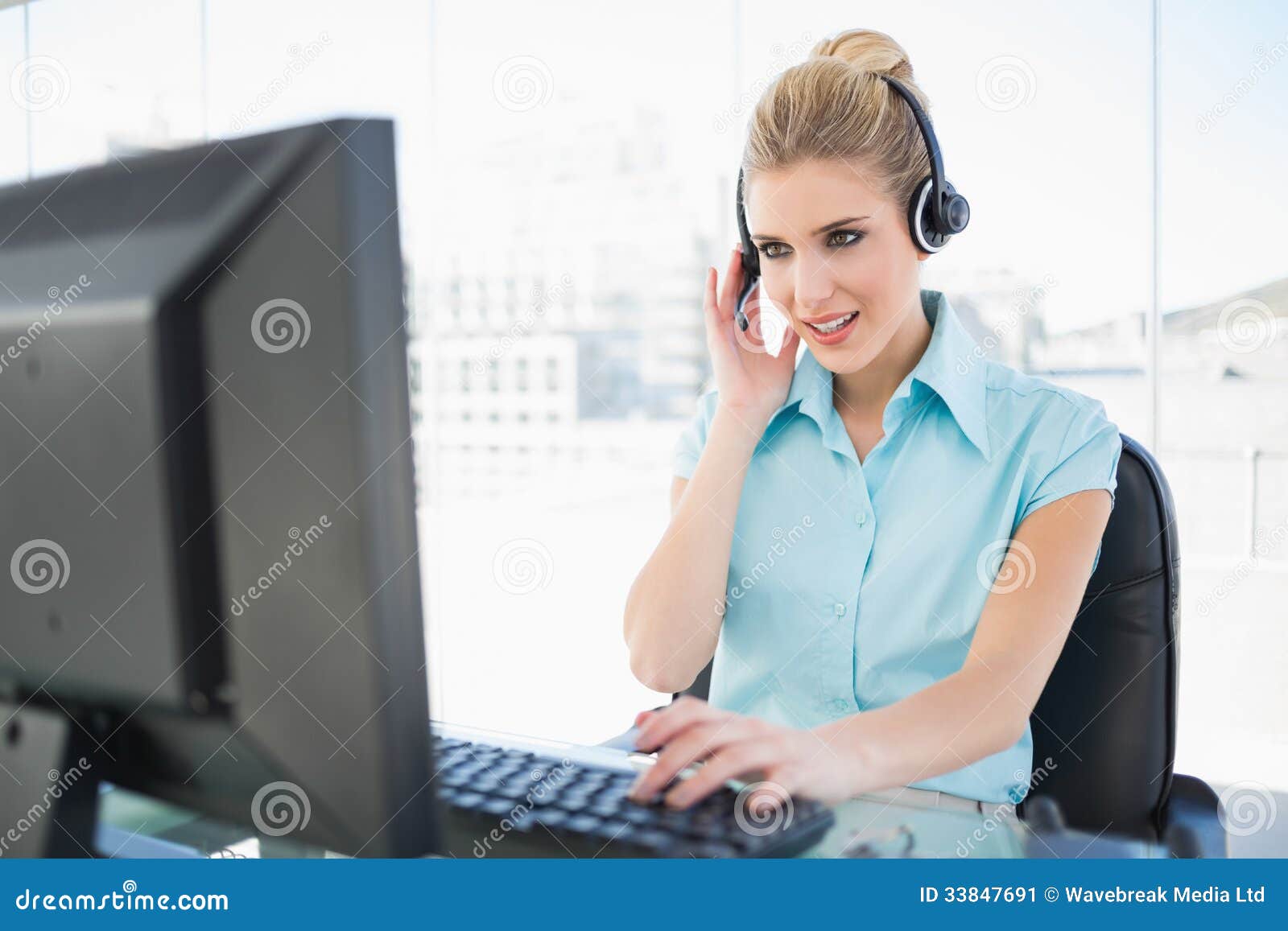 Focused Call Centre Agent Working on Computer Stock Image - Image of ...