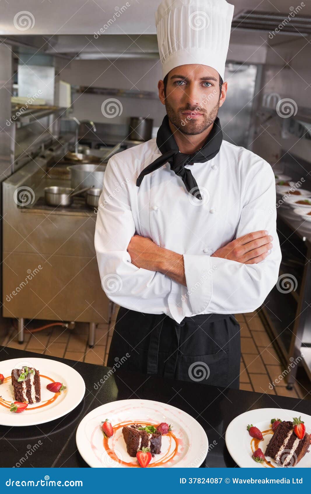 Focused Chef Looking at Camera Behind Counter of Desserts Stock Image ...