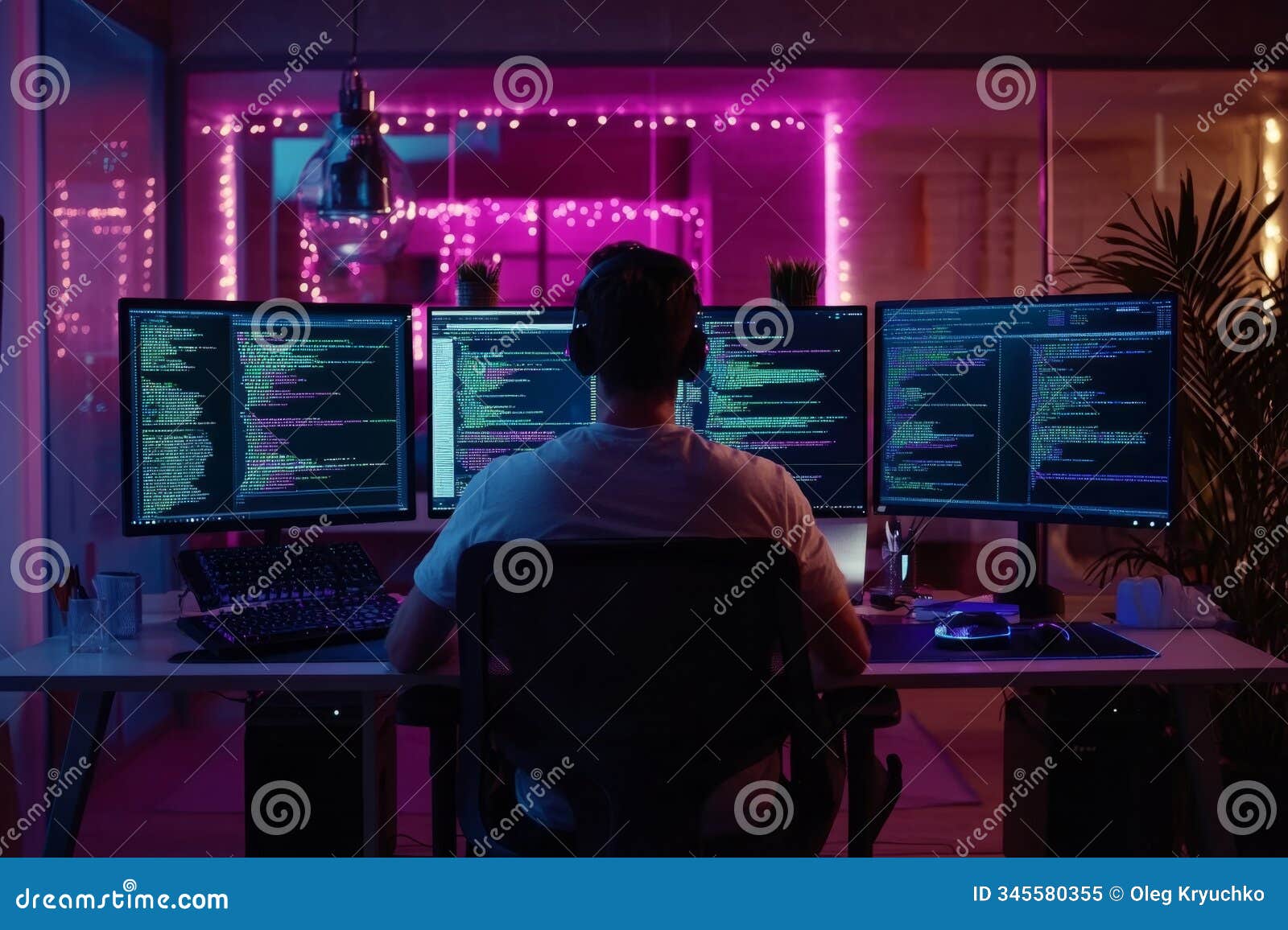 A Focused Coder Works In A Neon Lit Office Multiple Screens Display Coding And Programming