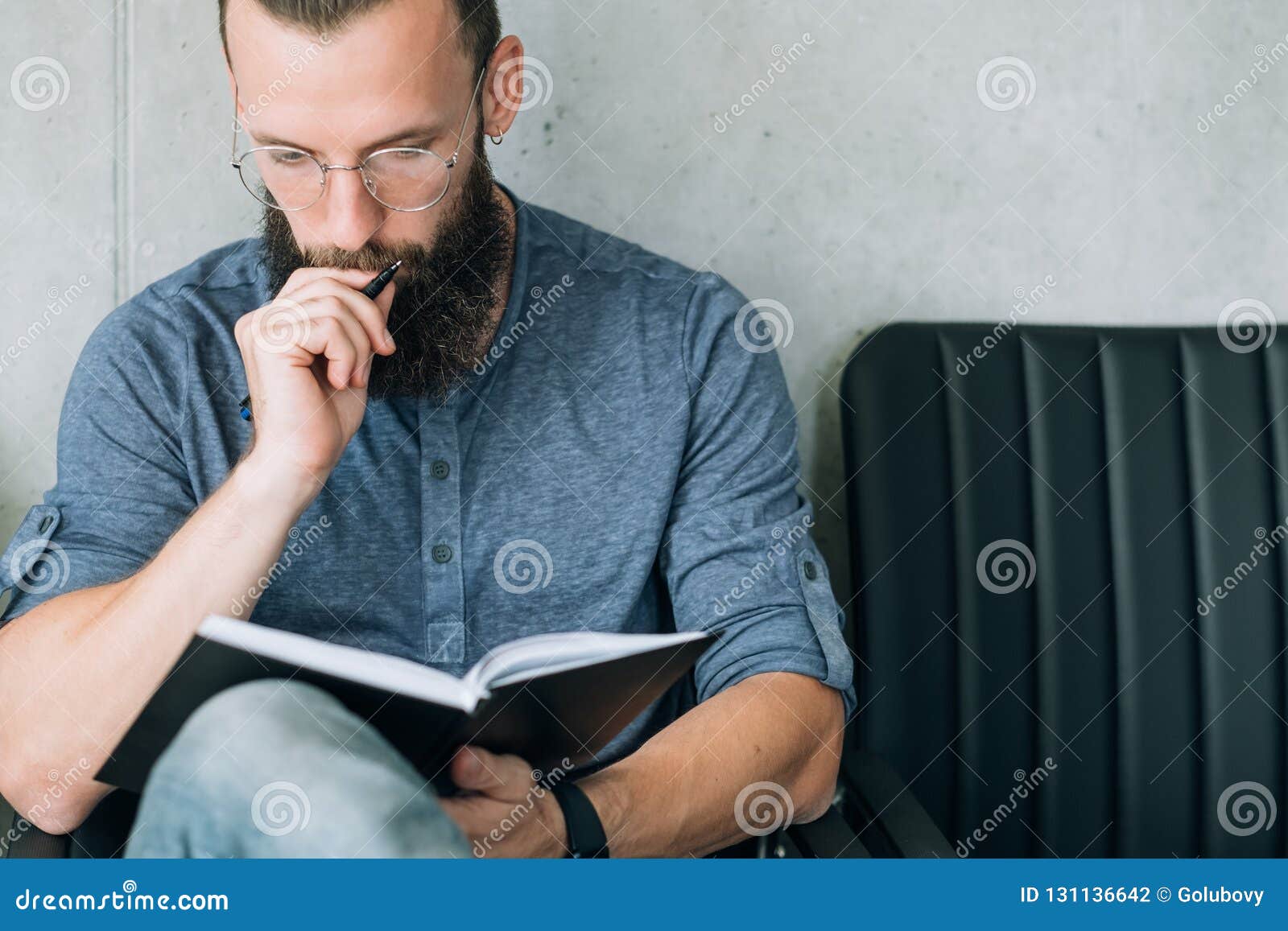 Focused Man Reading Notepad Business Data Analysis Stock Photo - Image ...