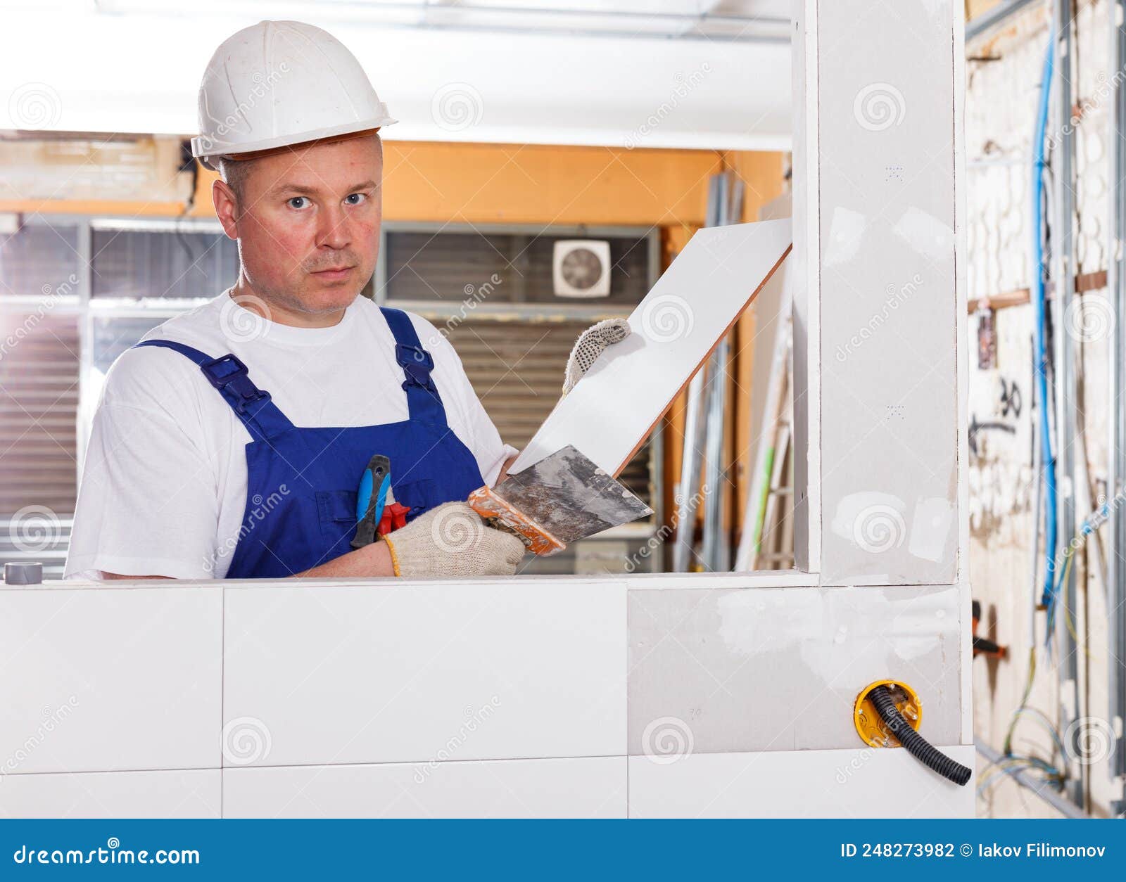 Worker Engaged in Wall Tiling Work Stock Photo - Image of occupation ...