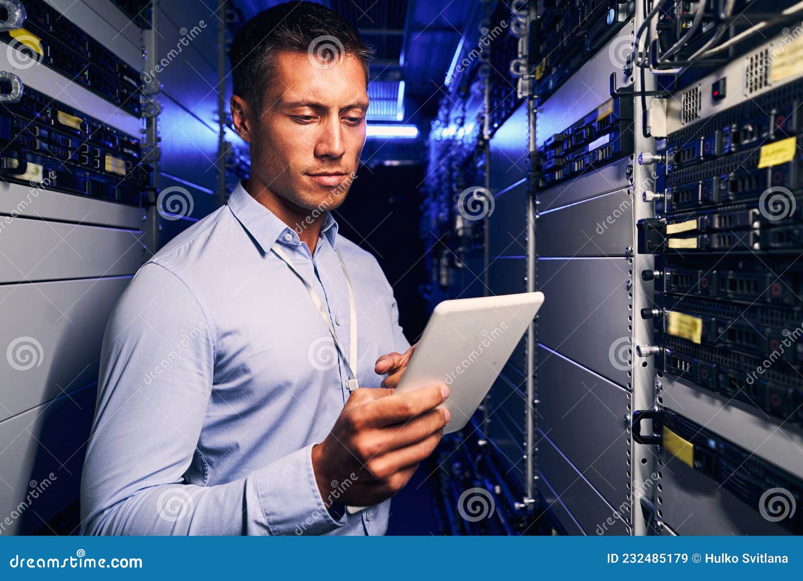Focused Data Center System Administrator Verifying Information Stock ...