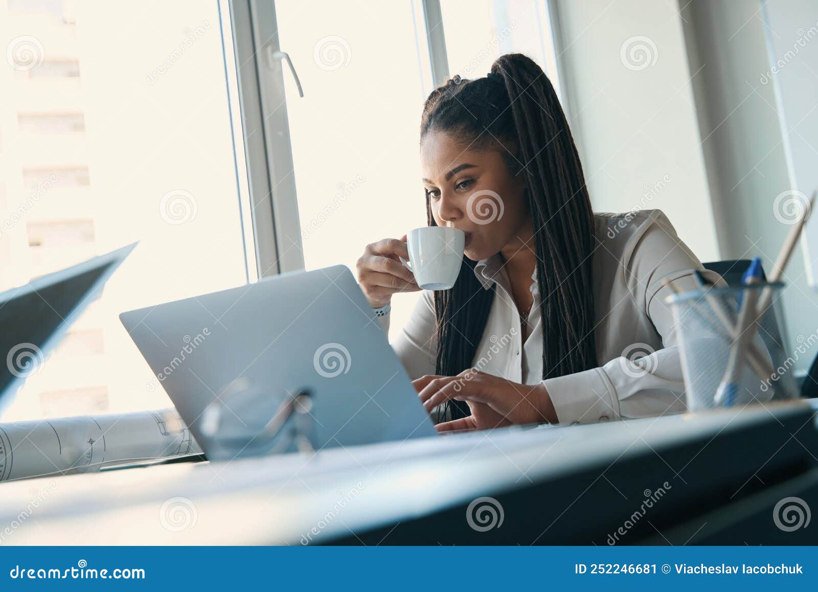 Focused Draftswoman Using Computer during Coffee Break Stock Image ...