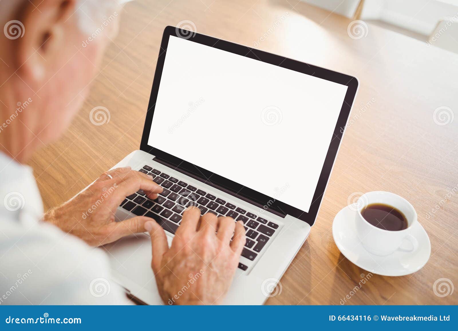 Focused Elderly Man Typing on Laptop Stock Photo - Image of space, life ...