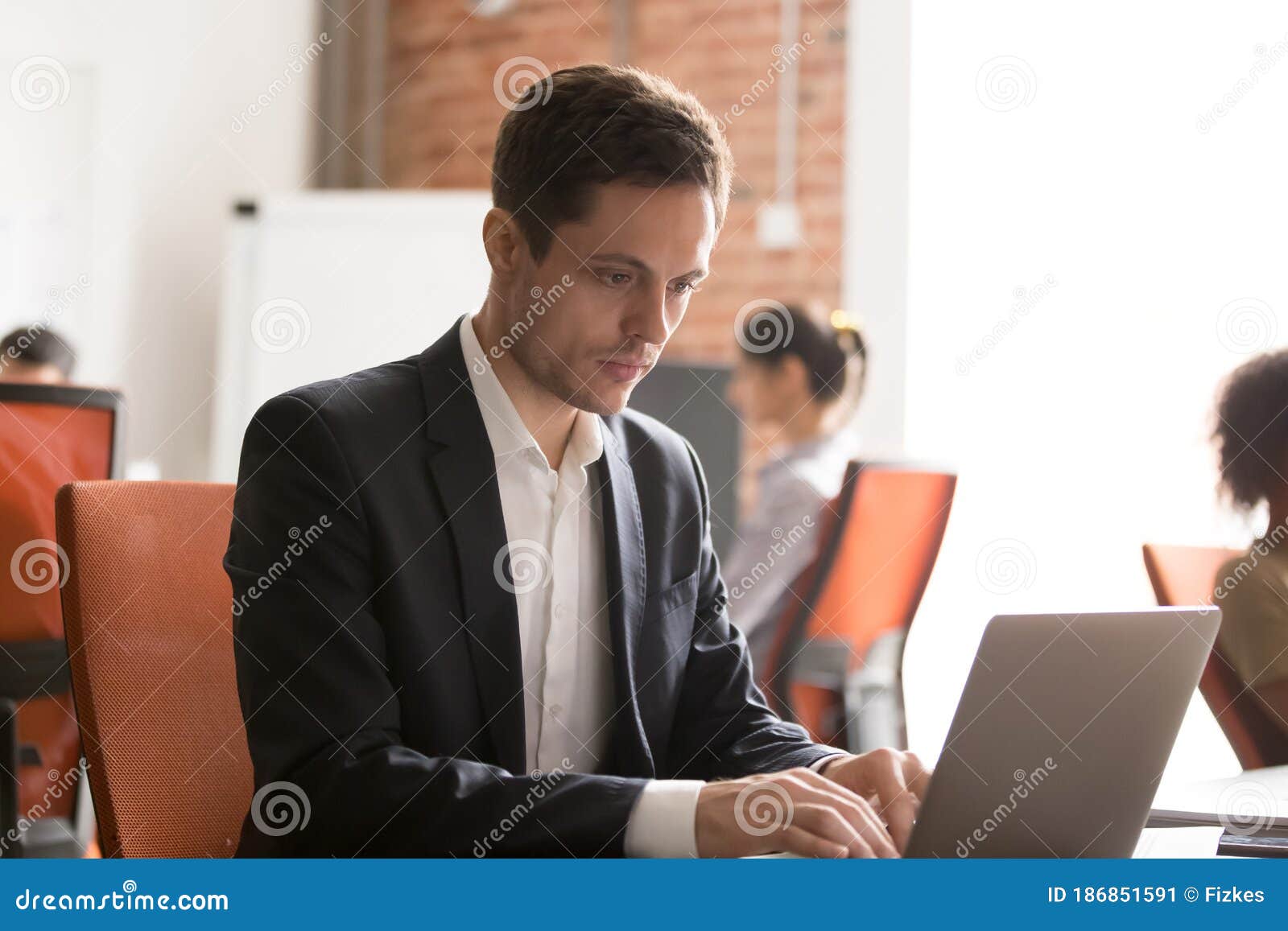 Focused Employee Intern Using Laptop, Working on Online Project Stock ...