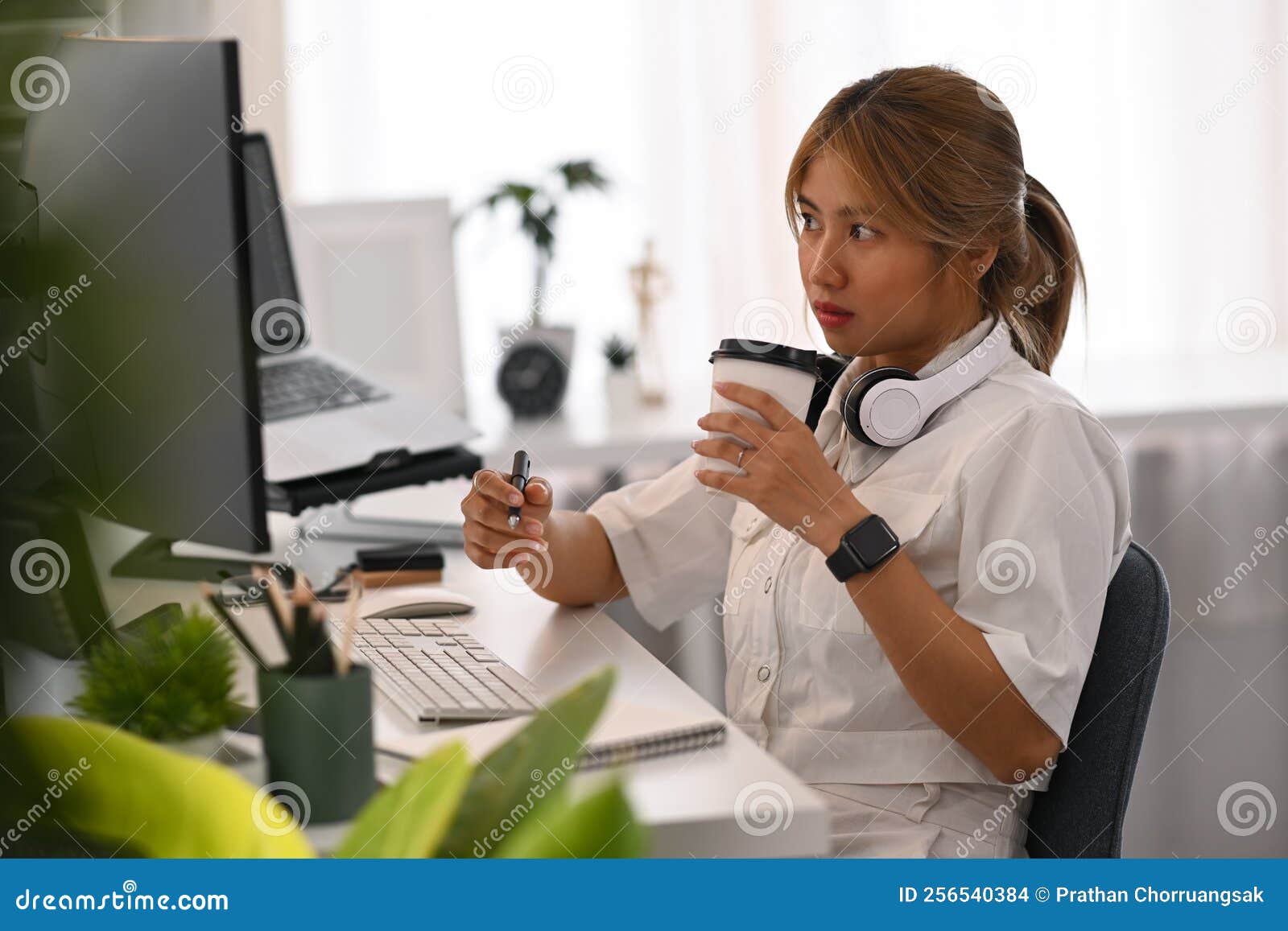 Focused Female Creative Freelancer Looking at Computer Screen, Working ...