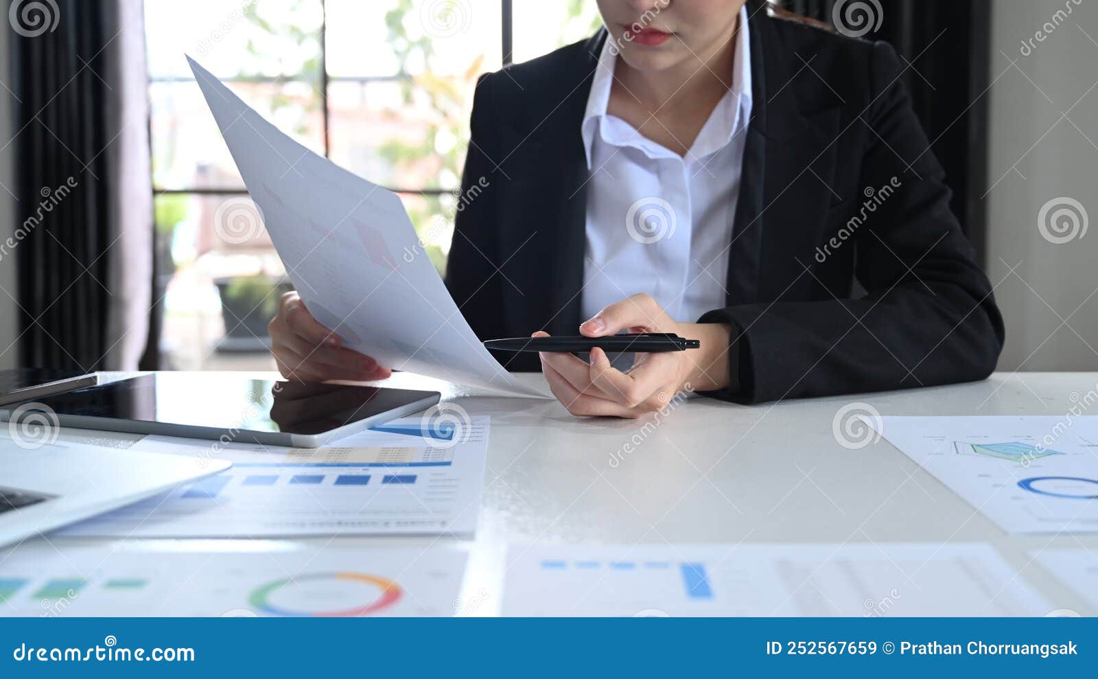 Economist Working With Accounting Documents At Her Office Desk. Royalty ...