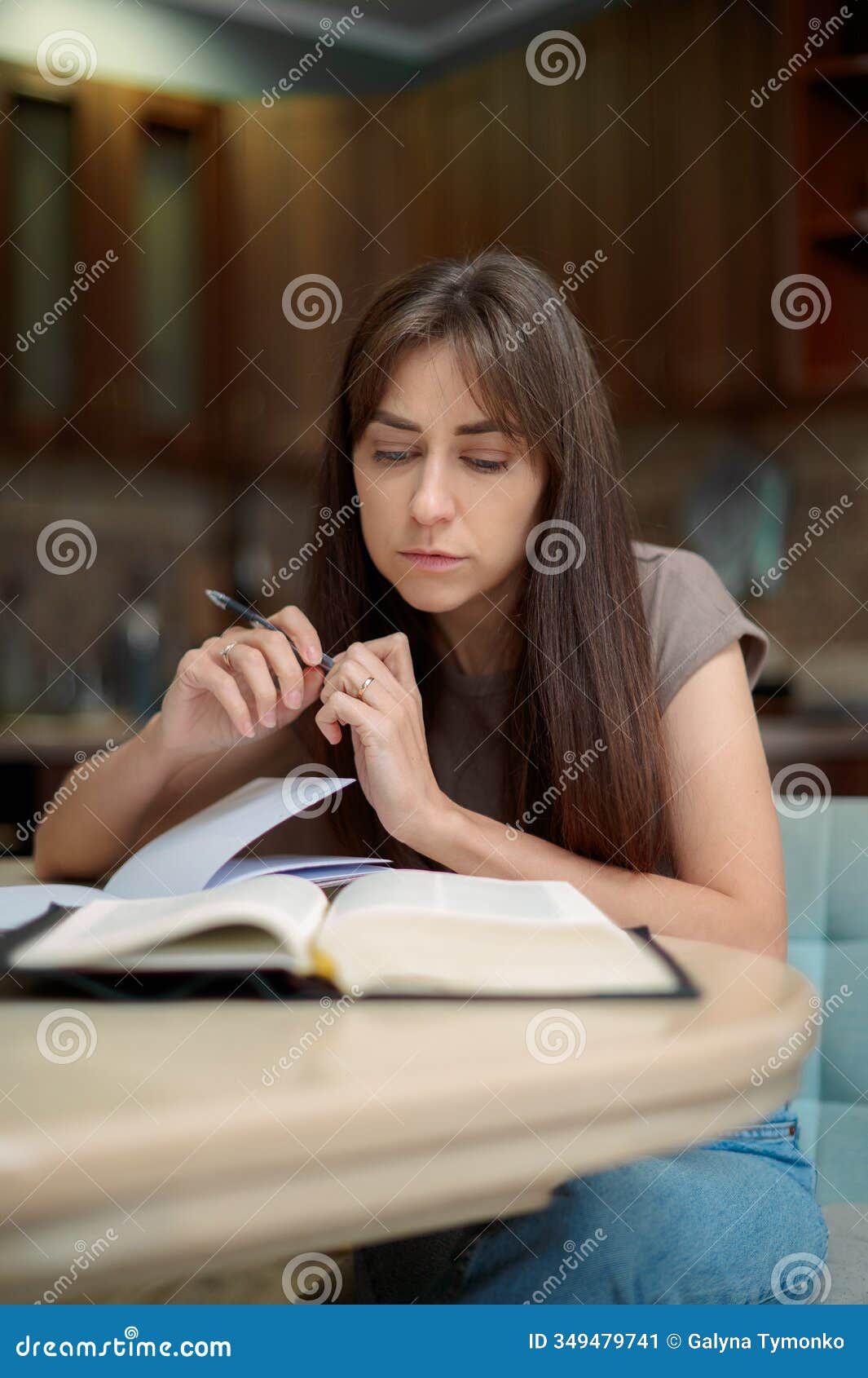 Focused Female Student Learning and Preparing Exam at Home, Reading ...