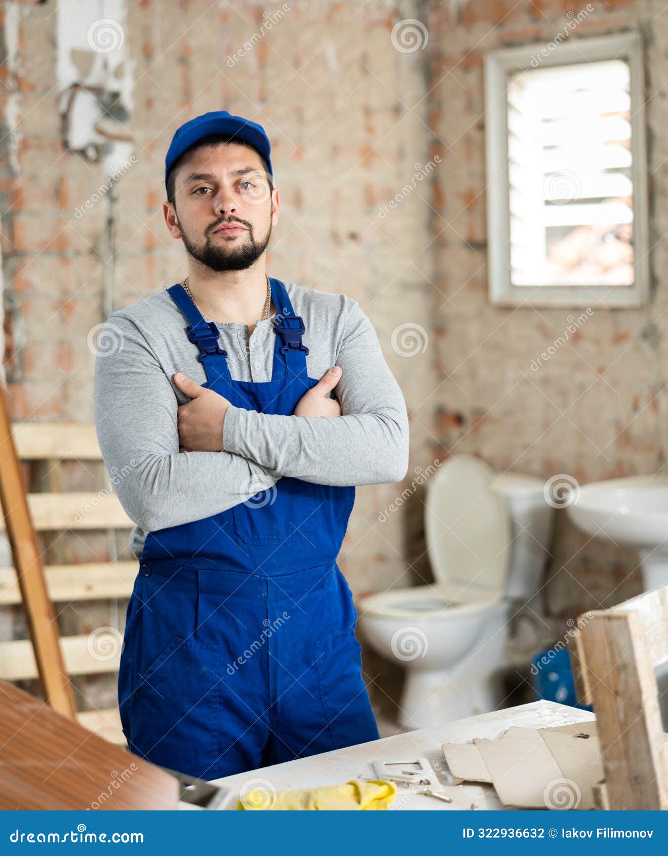 Focused Foreman Posing on Indoor Construction Site Stock Photo - Image ...