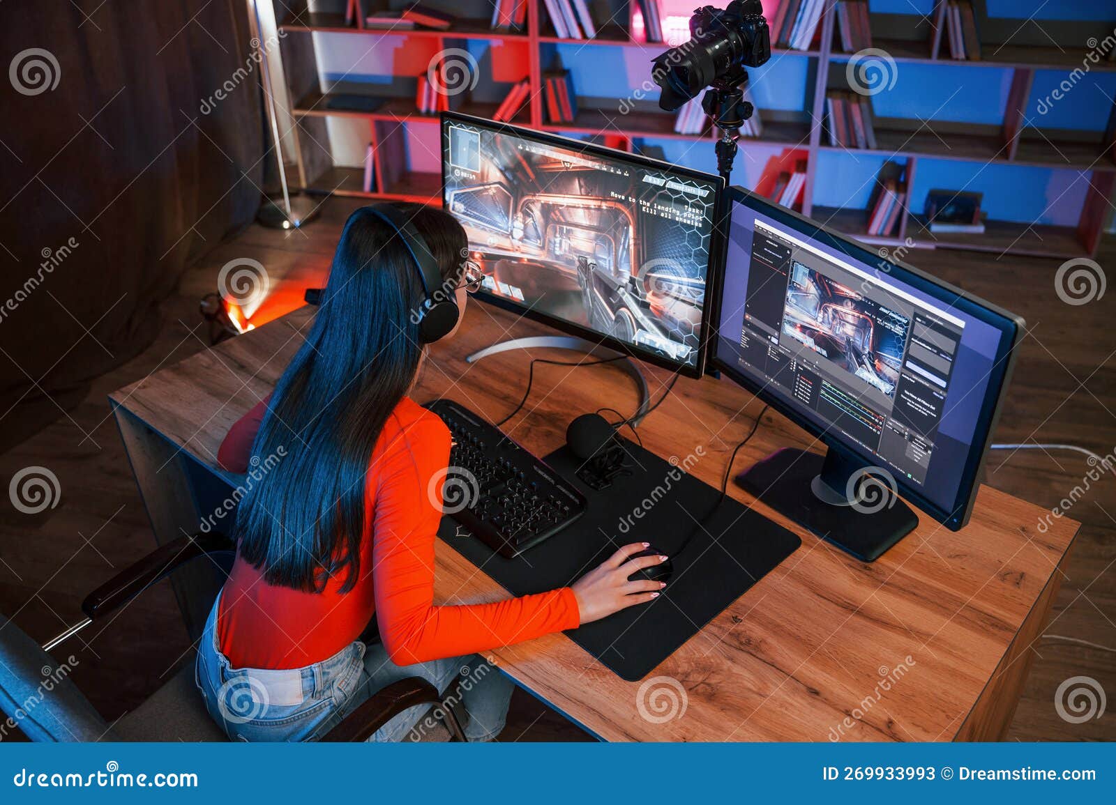 Focused on the Game Process. Young Beautiful Streamer is Indoors with ...