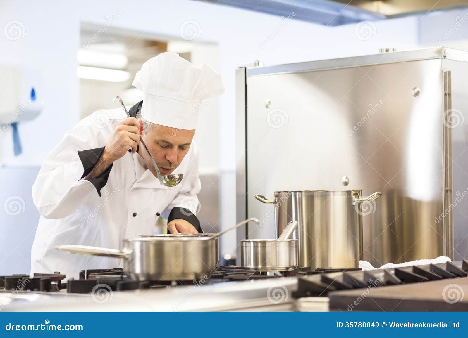 Focused Head Chef Tasting Food from Ladle Stock Image - Image of ...