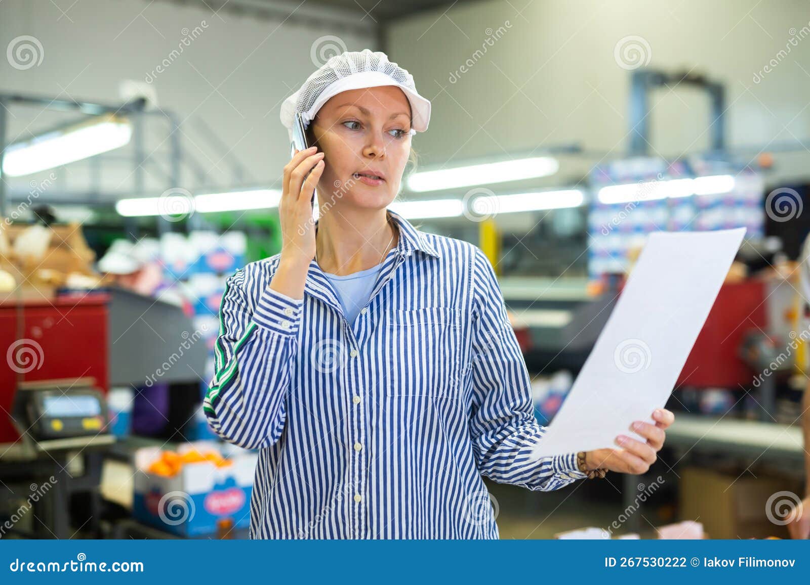Fruit Sorting Factory Forewoman with Papers Talking on Phone Stock ...