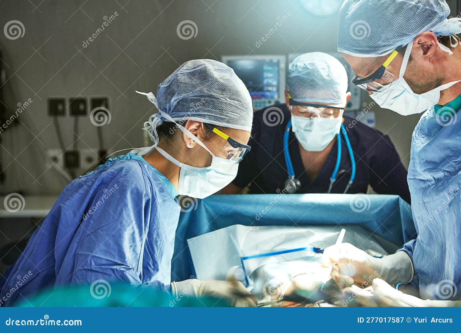 Focused on an Intricate Surgical Procedure. Surgeons in an Operating ...
