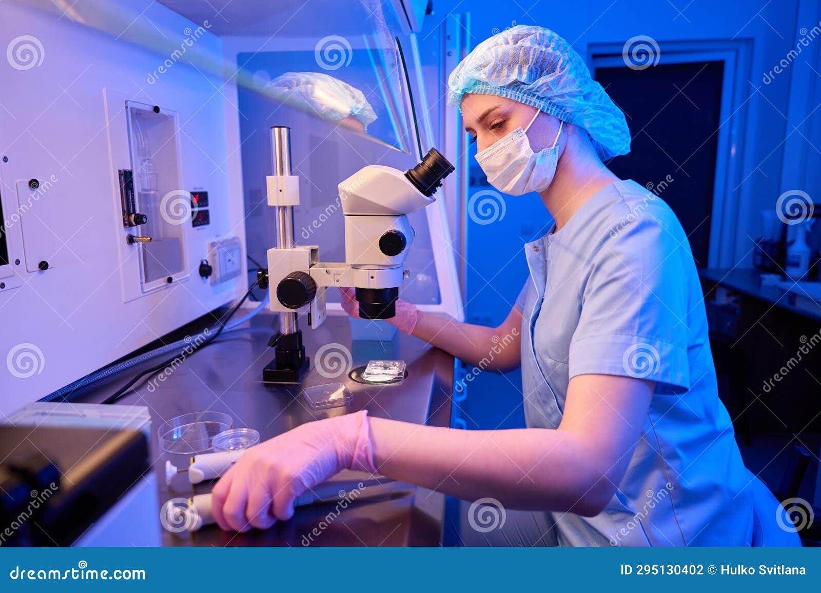 Focused Laboratory Scientist is Preparing for Cell Manipulation ...