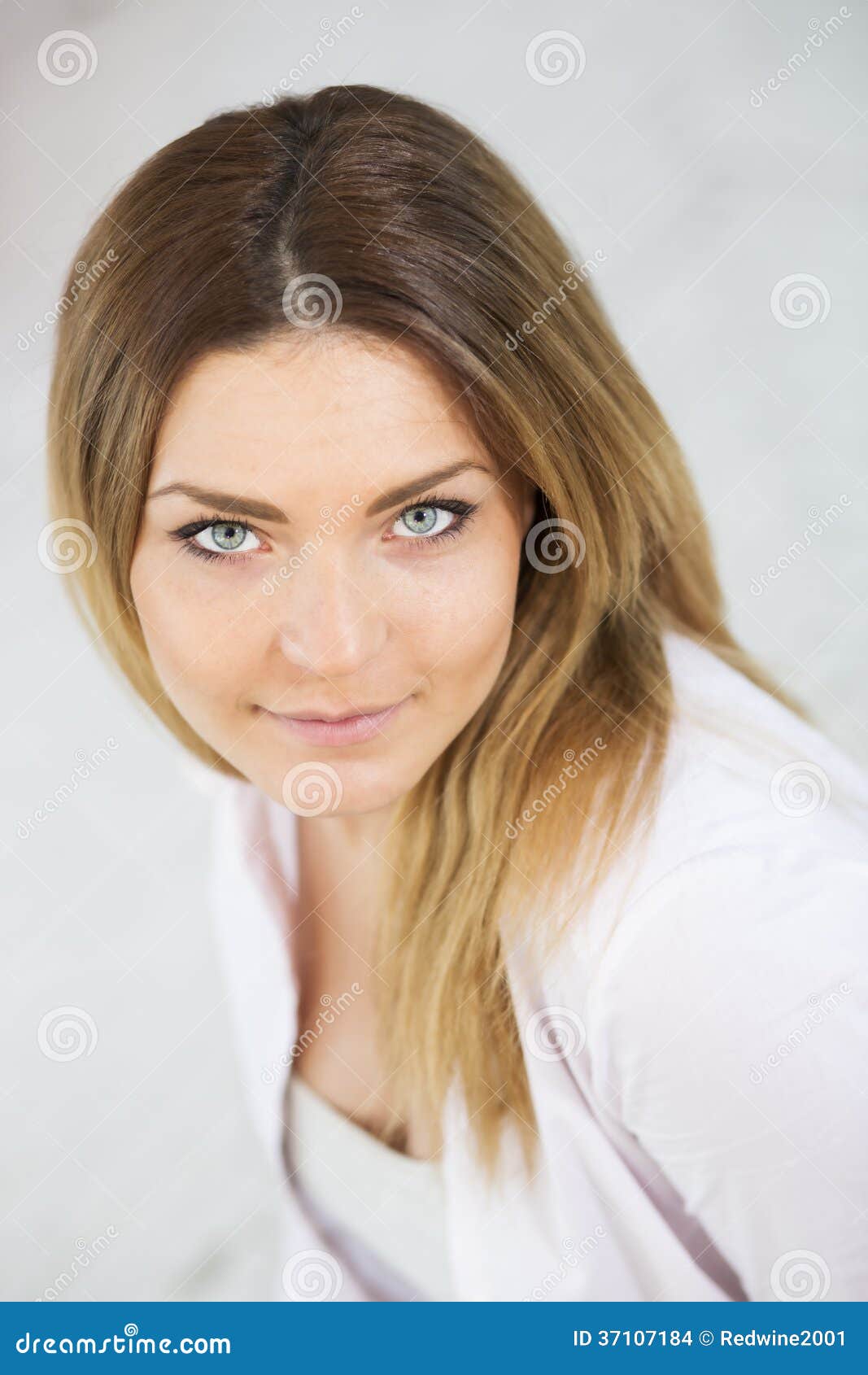 Focused Look of Woman in White Suit Stock Photo - Image of pose, body ...